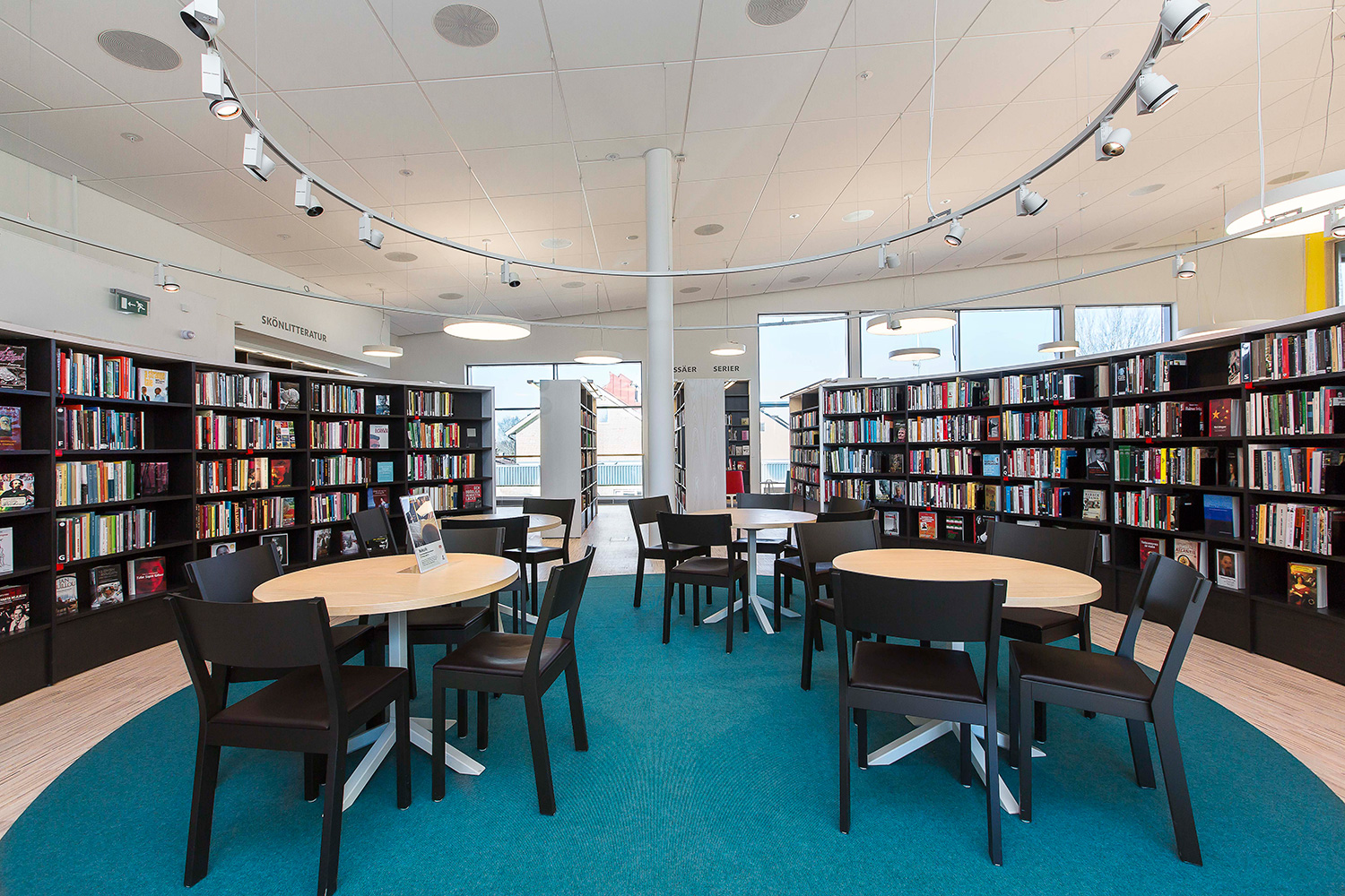 Create zones through the clever placement of carpets